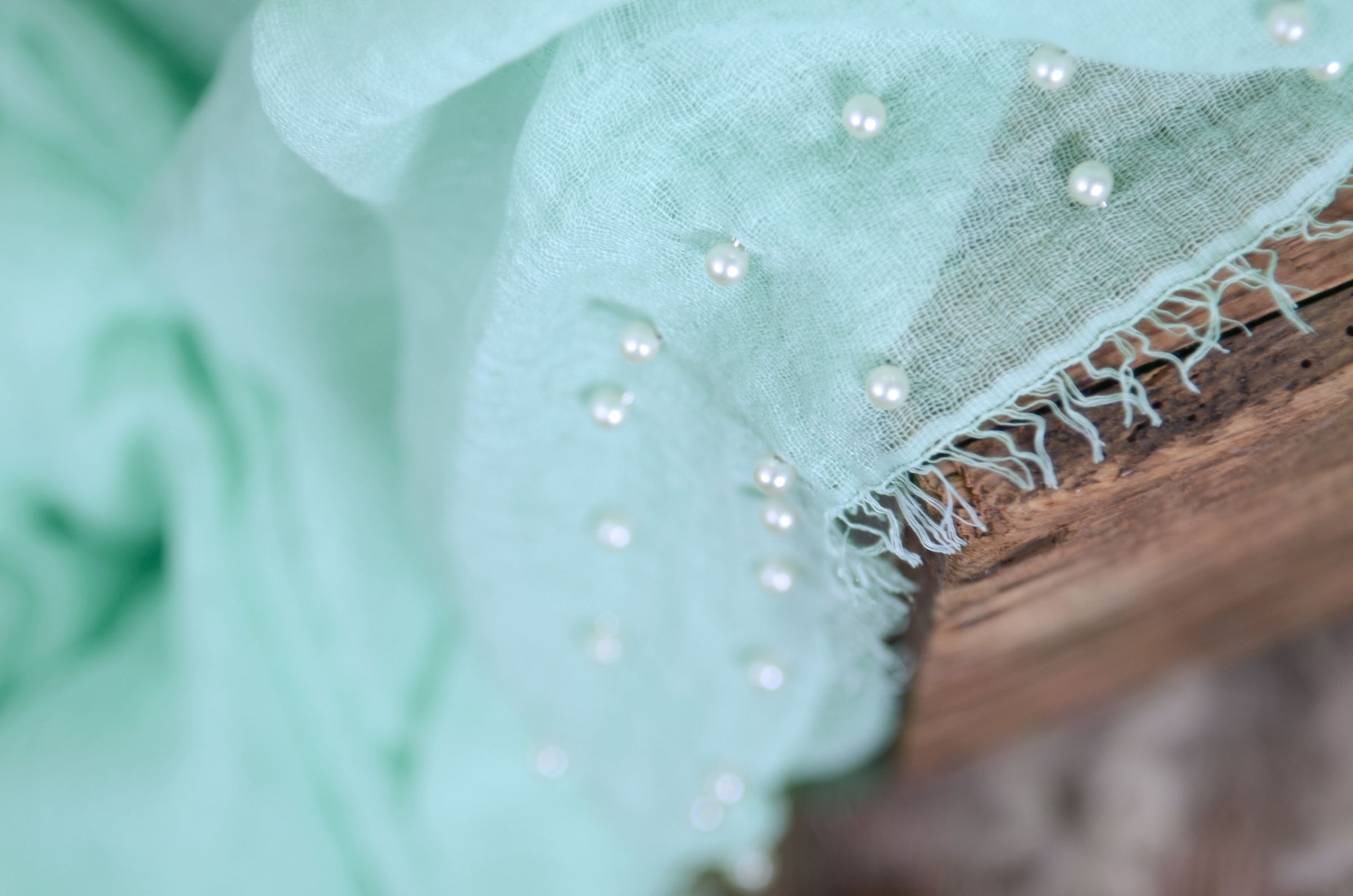 Mint green wrap with pearls