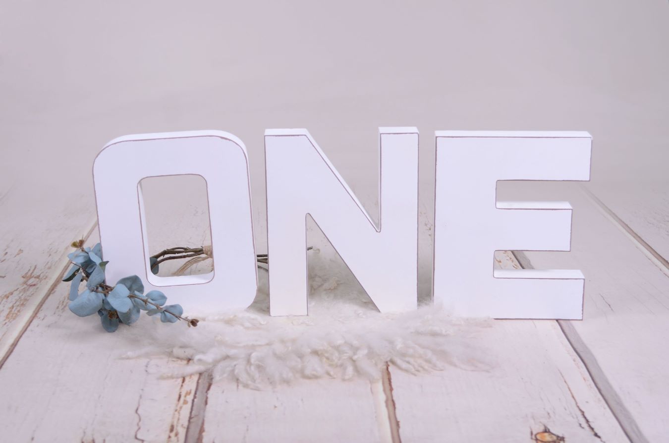 Large white ONE letters